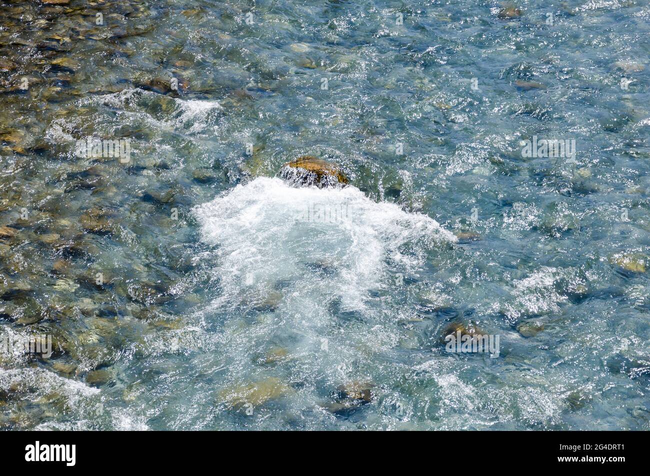 Top view of streaming river Stock Photo - Alamy