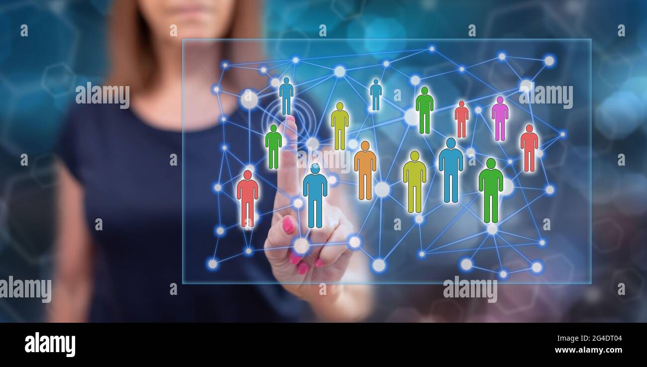 Woman touching a social network concept on a touch screen with her ...