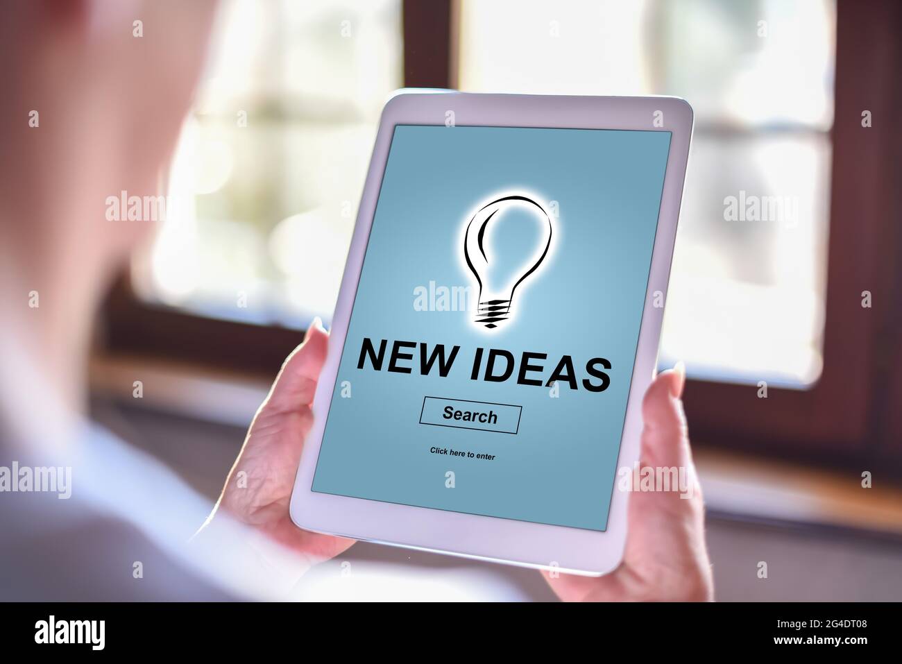 Tablet screen displaying a new ideas concept Stock Photo - Alamy