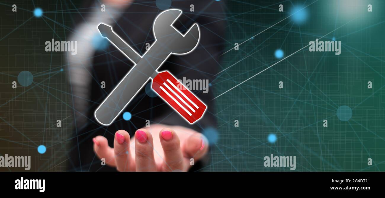 Maintenance service concept above the hand of a woman in background ...