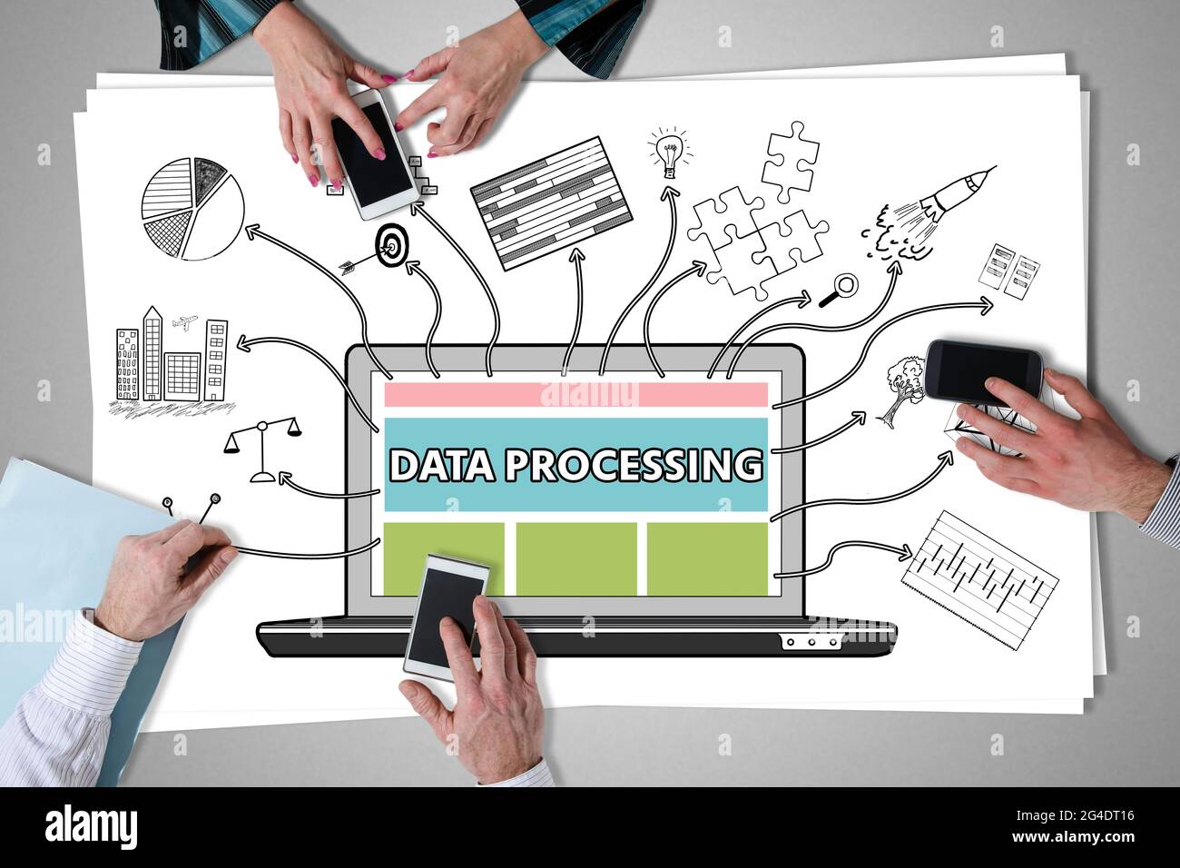Data processing concept placed on a desk with hands using smartphones ...