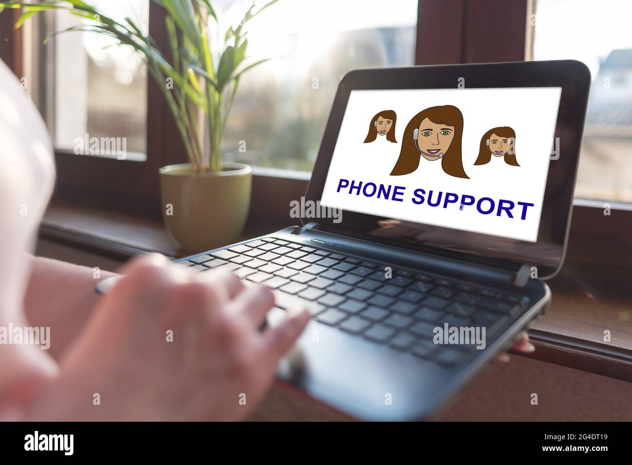 Laptop screen displaying a phone support concept Stock Photo - Alamy