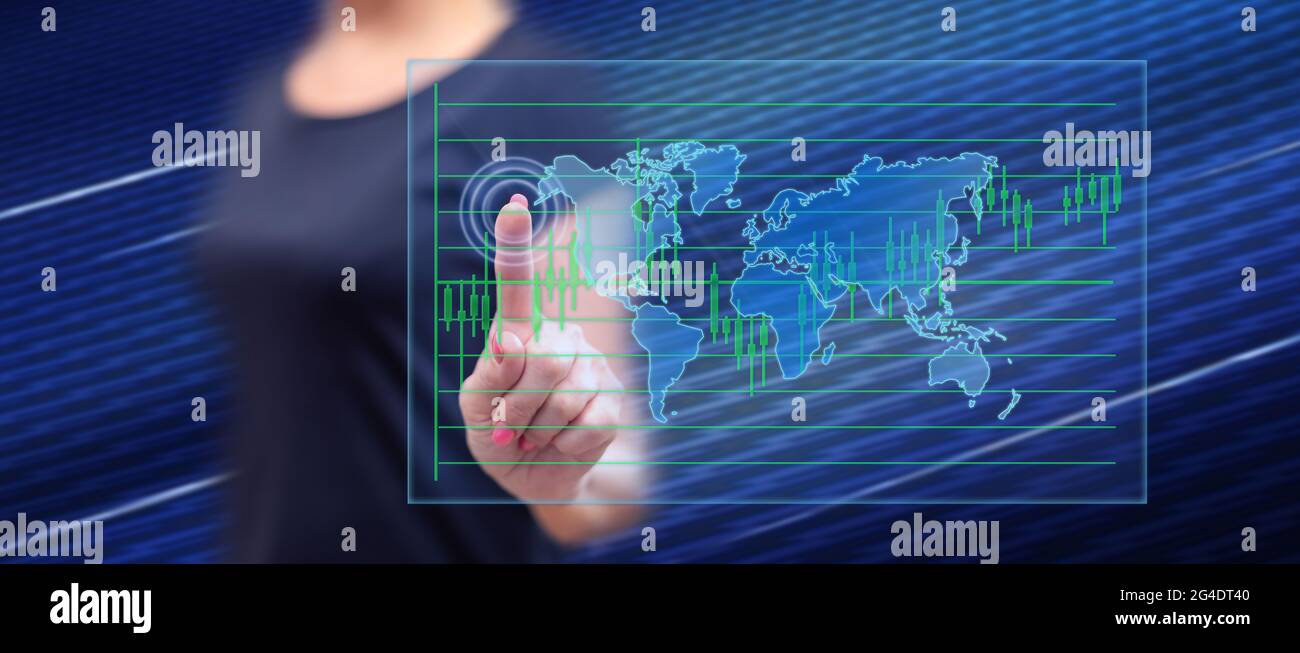Woman touching a global business concept on a touch screen with her ...
