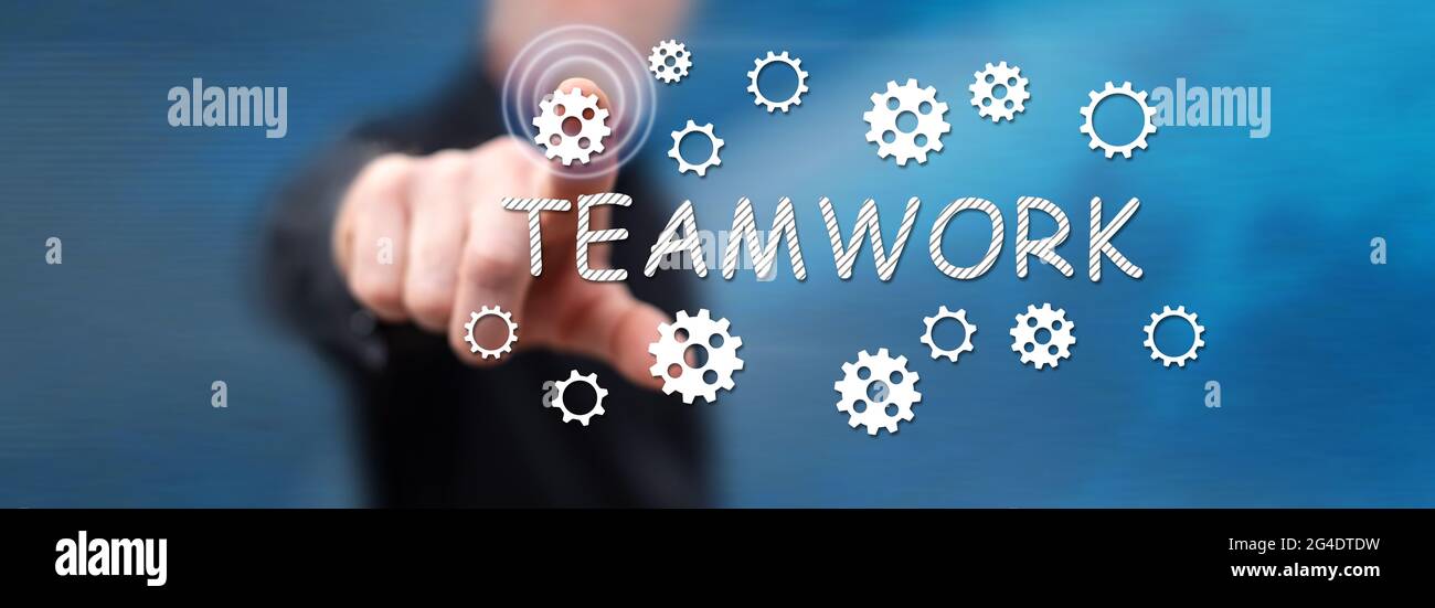 Man touching a teamwork concept on a touch screen with his finger Stock ...