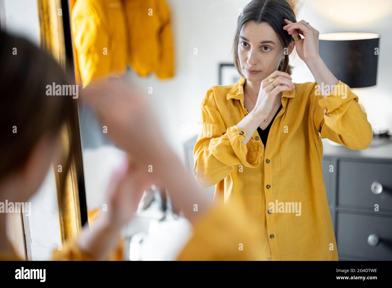 Woman getting ready at home hi-res stock photography and images - Alamy
