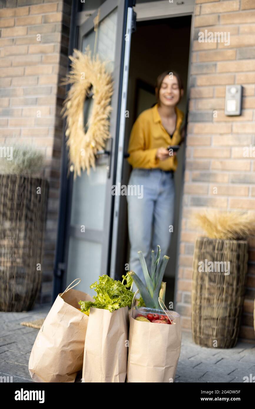 Receiving the food parcel hi-res stock photography and images - Alamy
