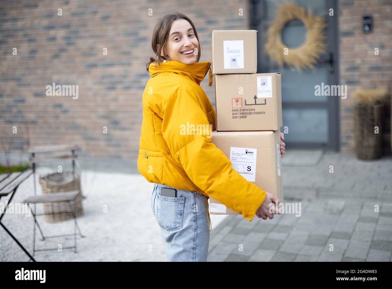 Woman coming home hi-res stock photography and images - Alamy