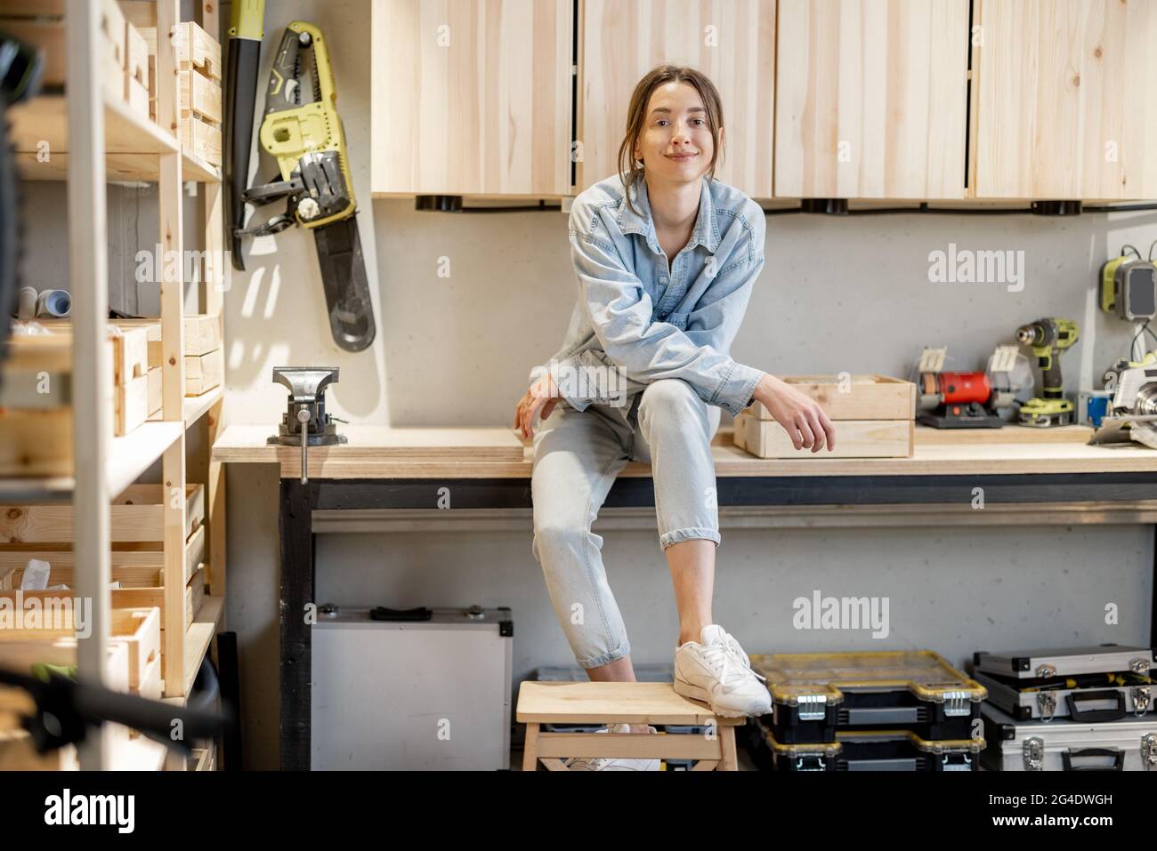 Handywoman in the home workshop Stock Photo - Alamy