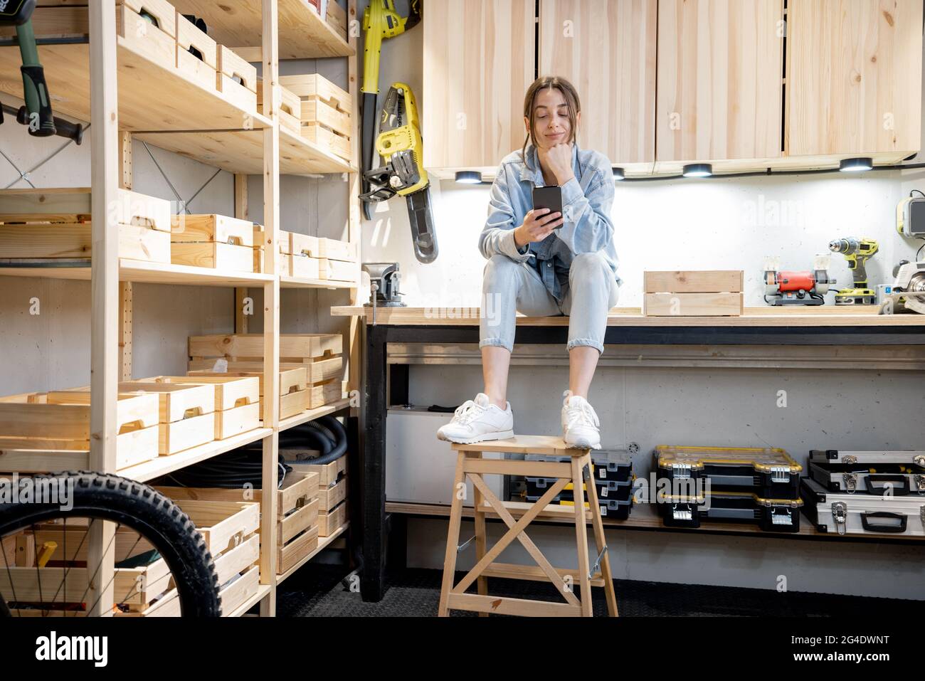 Handywoman in the home workshop Stock Photo - Alamy