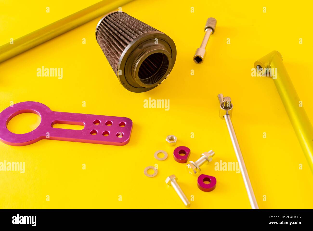 flat lay car spare parts details isolated on the table, minimalist ...