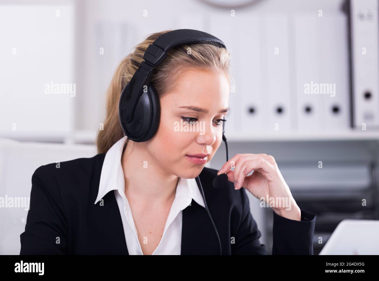 Female call center operator working Stock Photo - Alamy