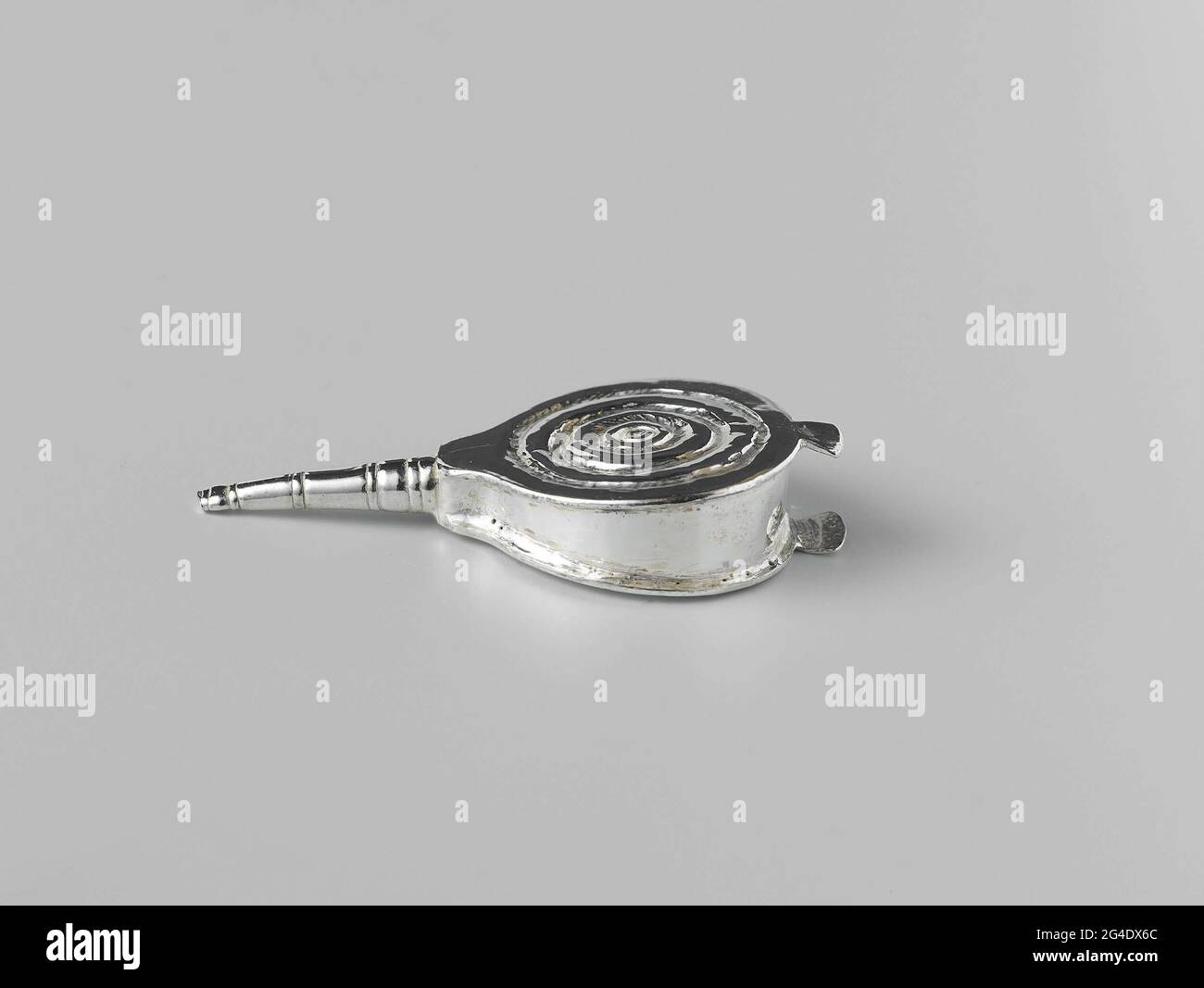 . Bellow of silver, with profiled spout. The bellows decorated with ...