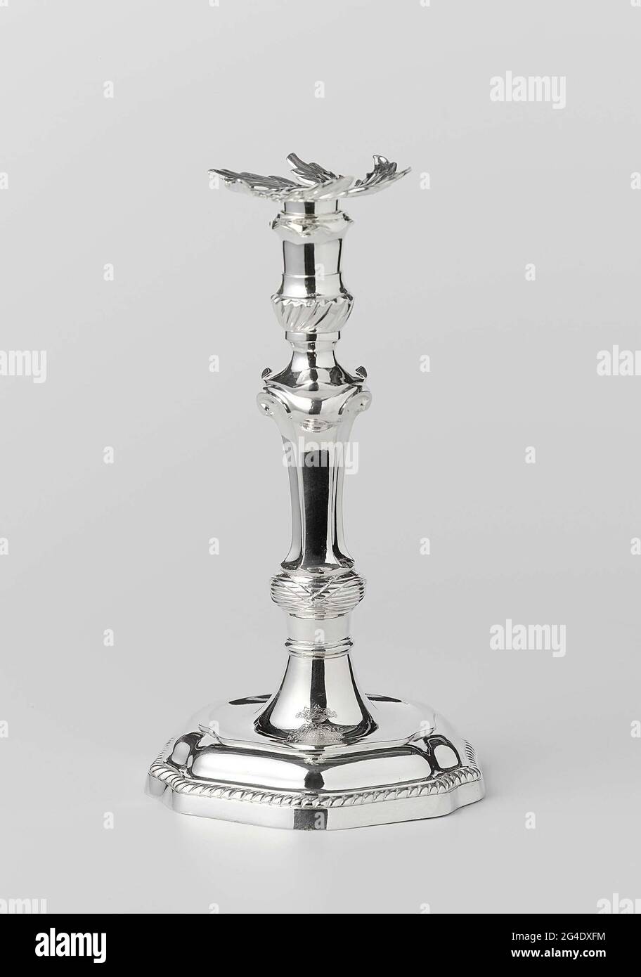 . Candlestick of silver. The foot and trunk are hexagonal. The fat ...