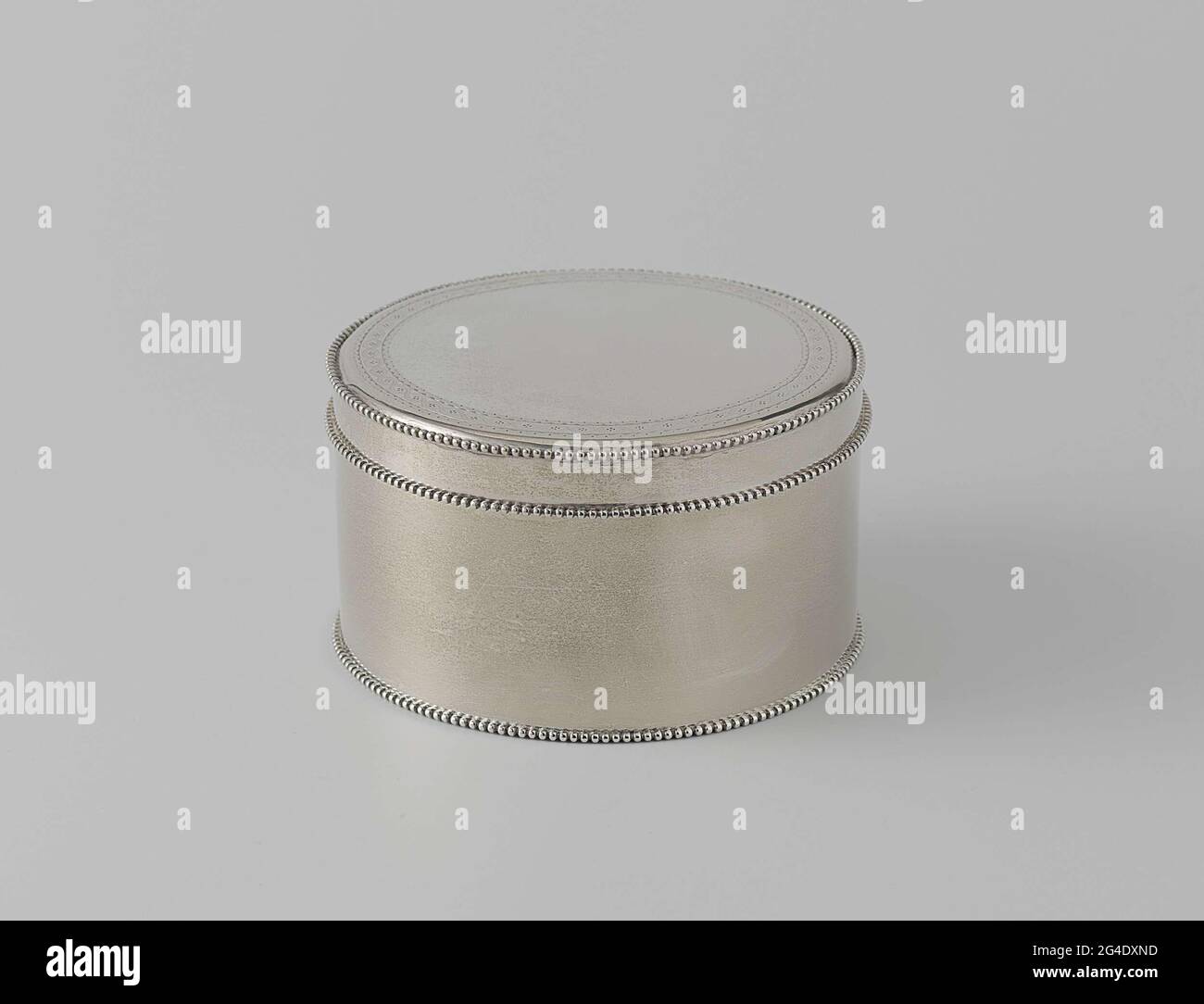 . These two plain containers are decorated only with a beaded edge ...