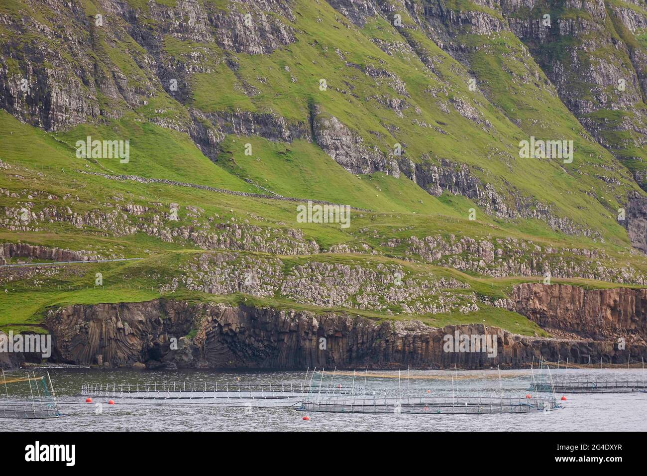 Salmon fishing farm pools in Faroe islands fjords. Aquaculture industry ...