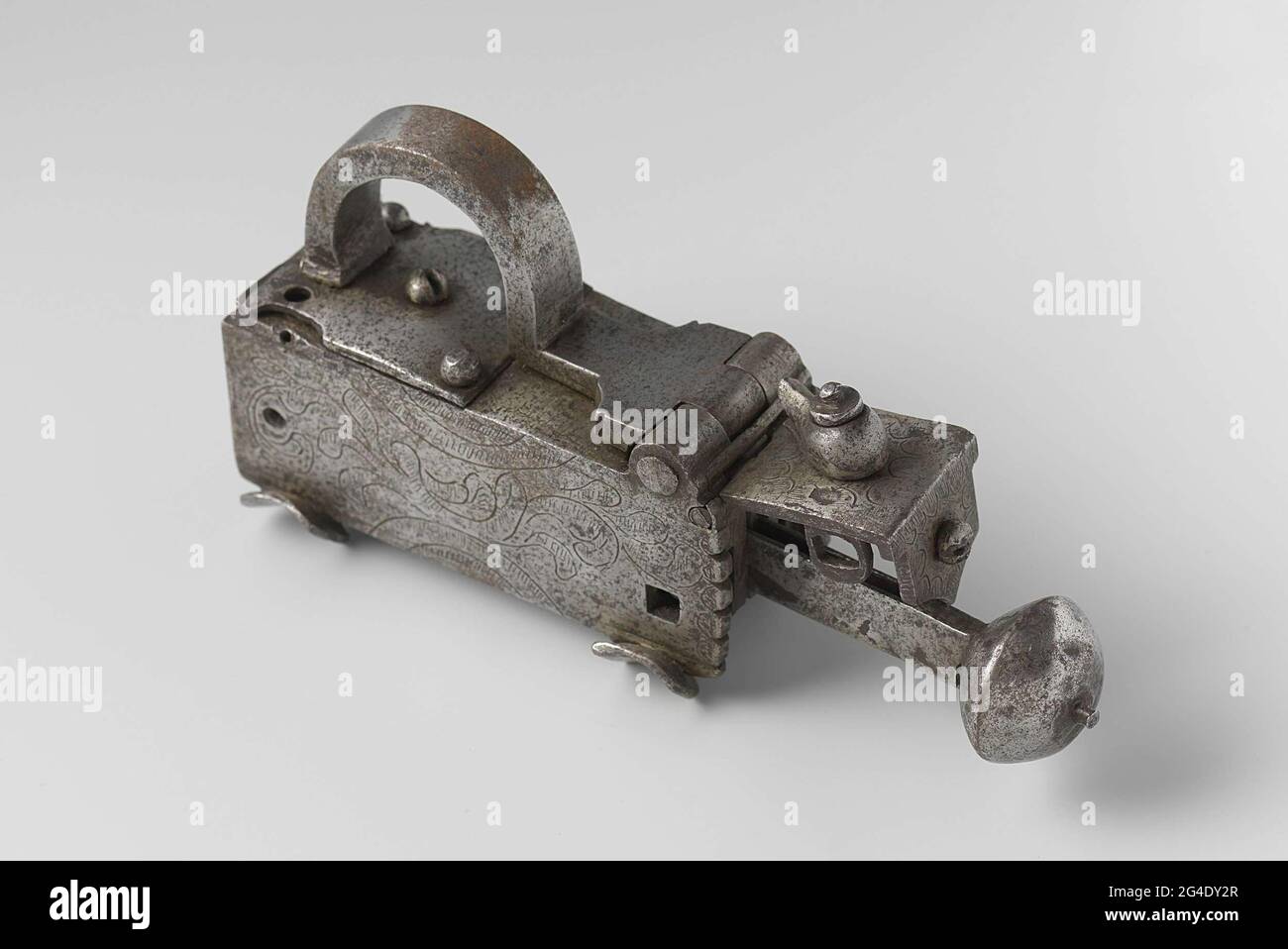 . An elongated padlock with etched flowers, with key Stock Photo - Alamy