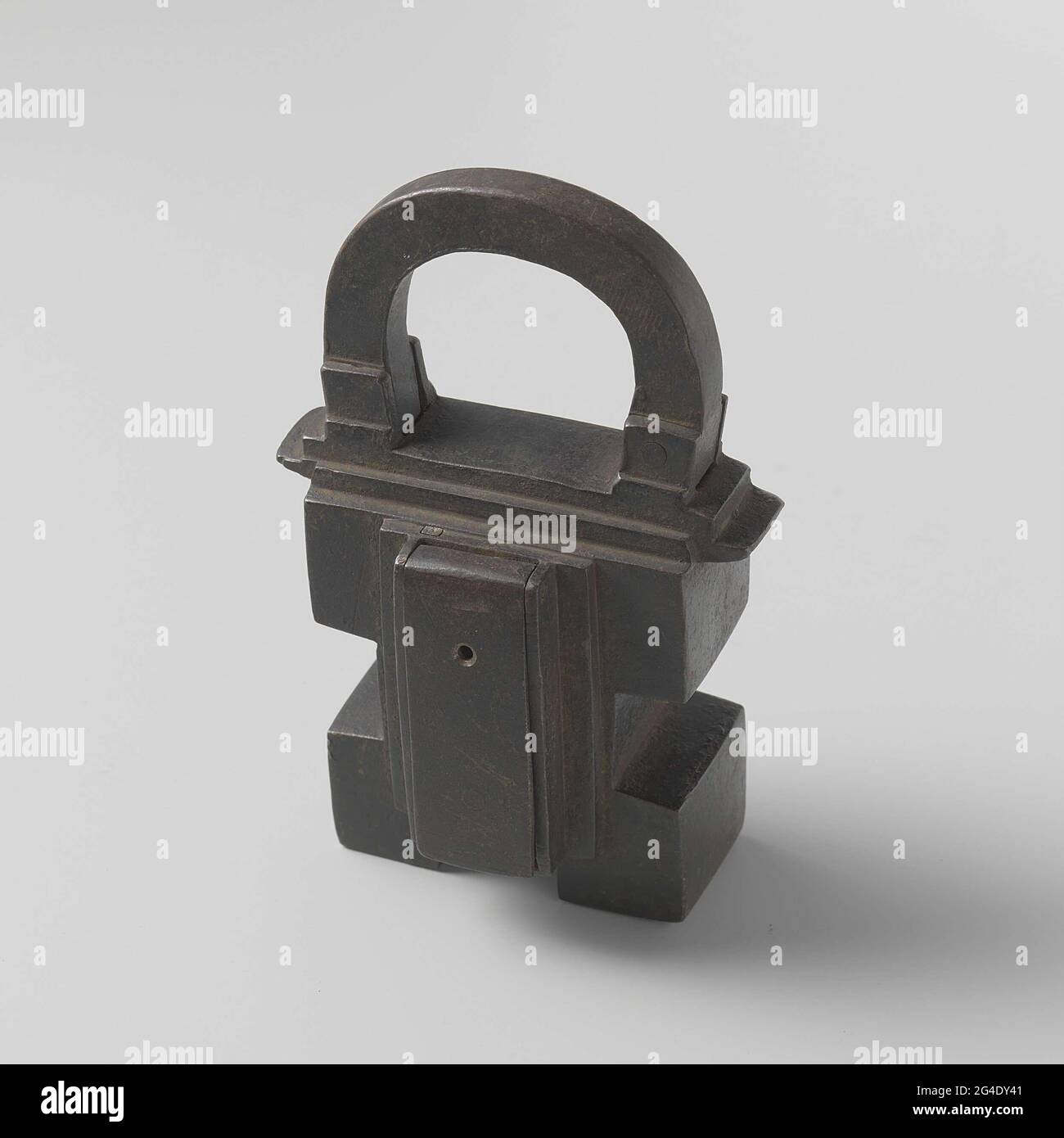 . A square iron padlock with tracing corners and raised keyhole ...