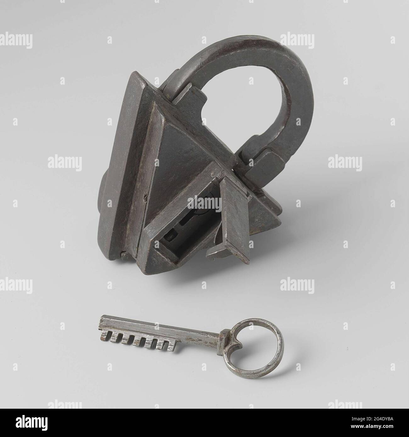 . A triangular padlock with key Stock Photo - Alamy