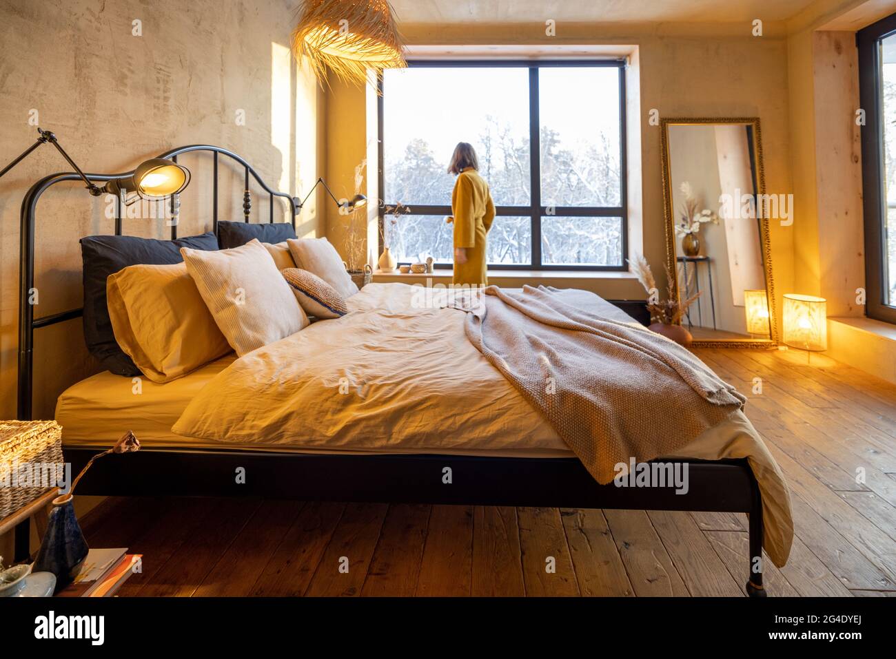 Stylish bedroom interior in natural boho style Stock Photo - Alamy
