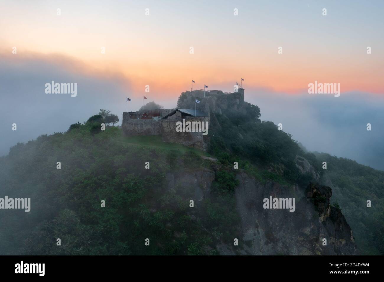 Aerial view about castle of Sirok with misty matra mountains at the ...