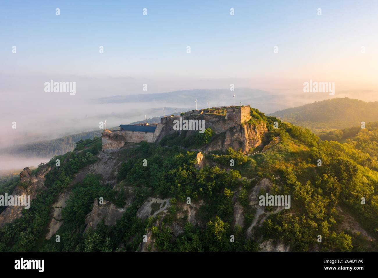 Aerial view about castle of Sirok with misty matra mountains at the ...