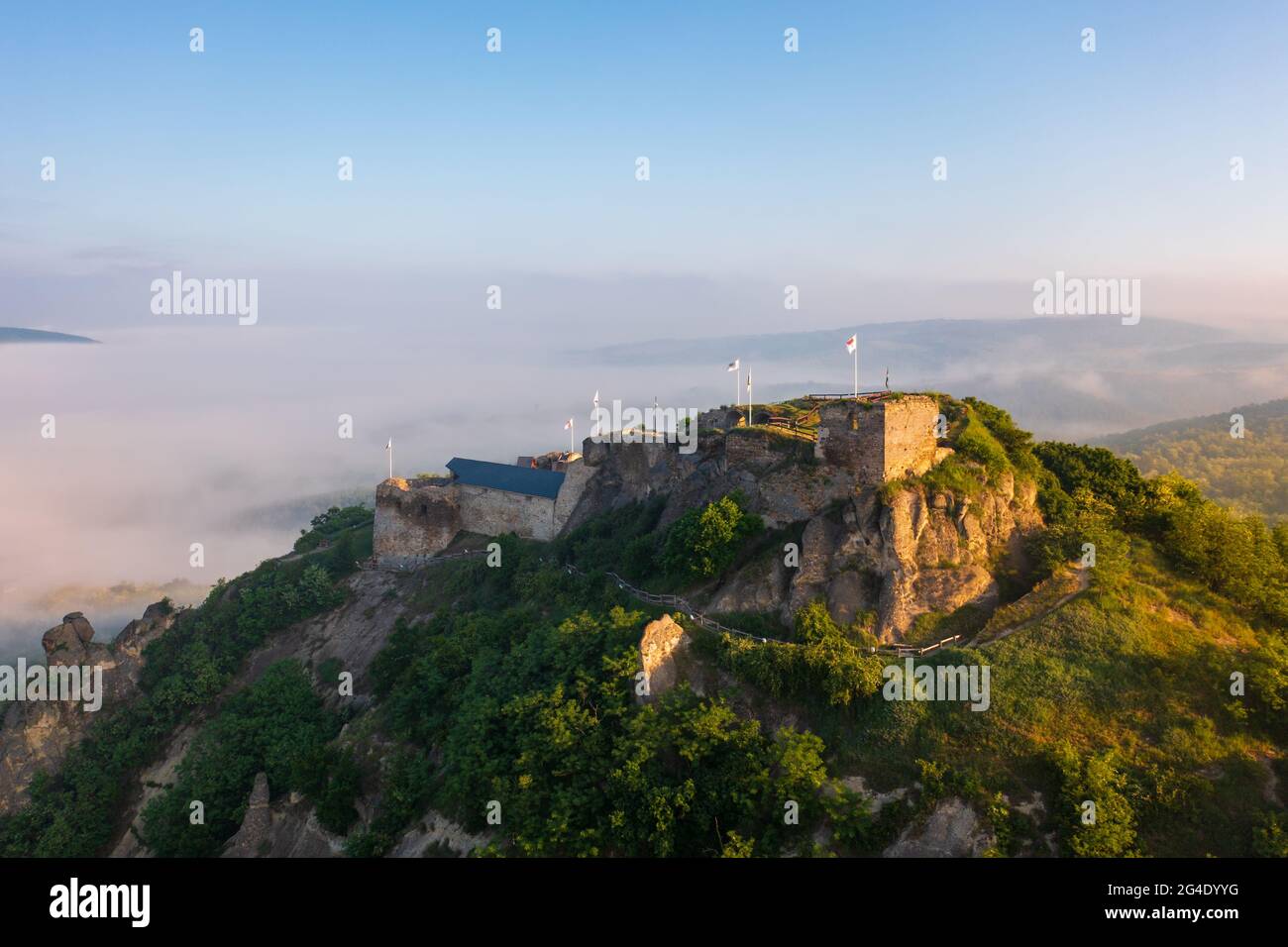 Aerial view about castle of Sirok with misty matra mountains at the ...