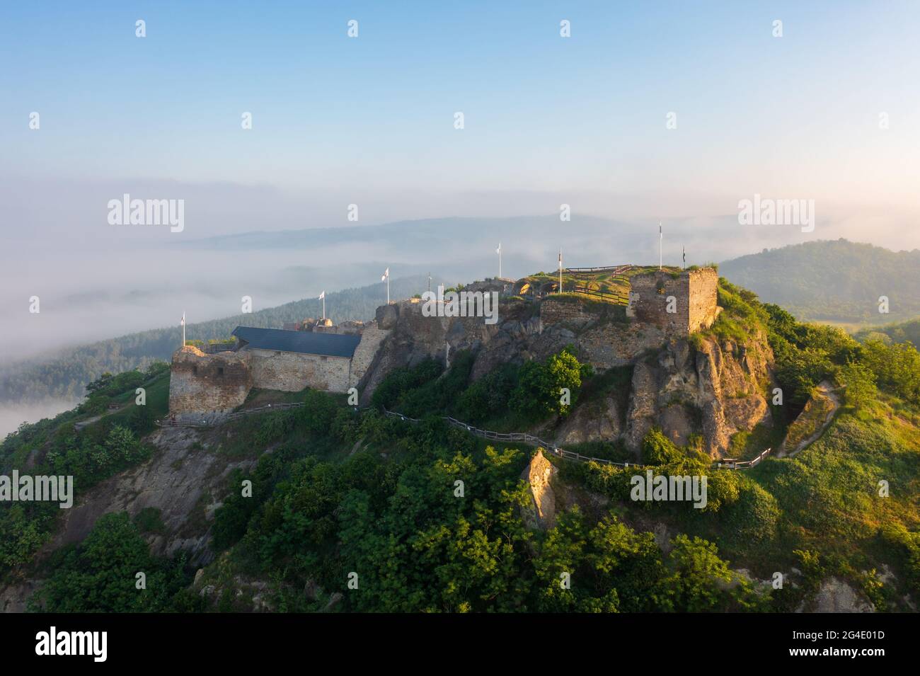 Aerial view about castle of Sirok with misty matra mountains at the ...