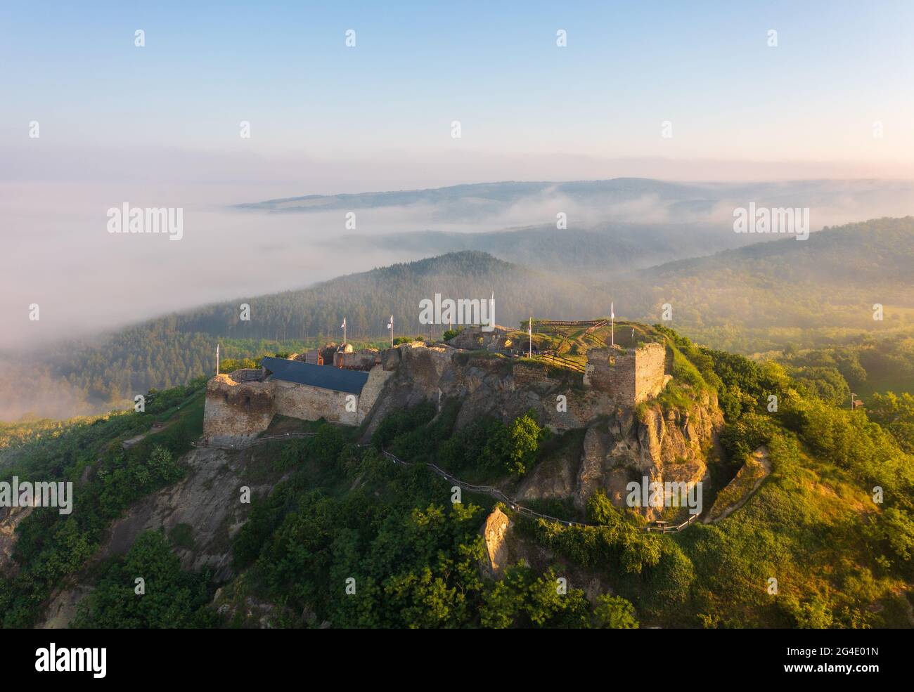 Aerial view about castle of Sirok with misty matra mountains at the ...