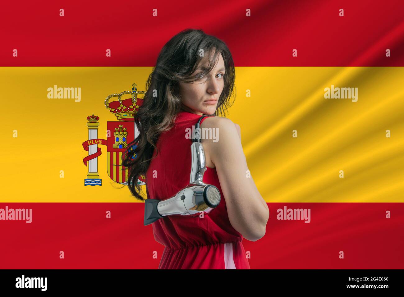 Beauty industry in Spain Happy female hairdresser holding hairdryer ...