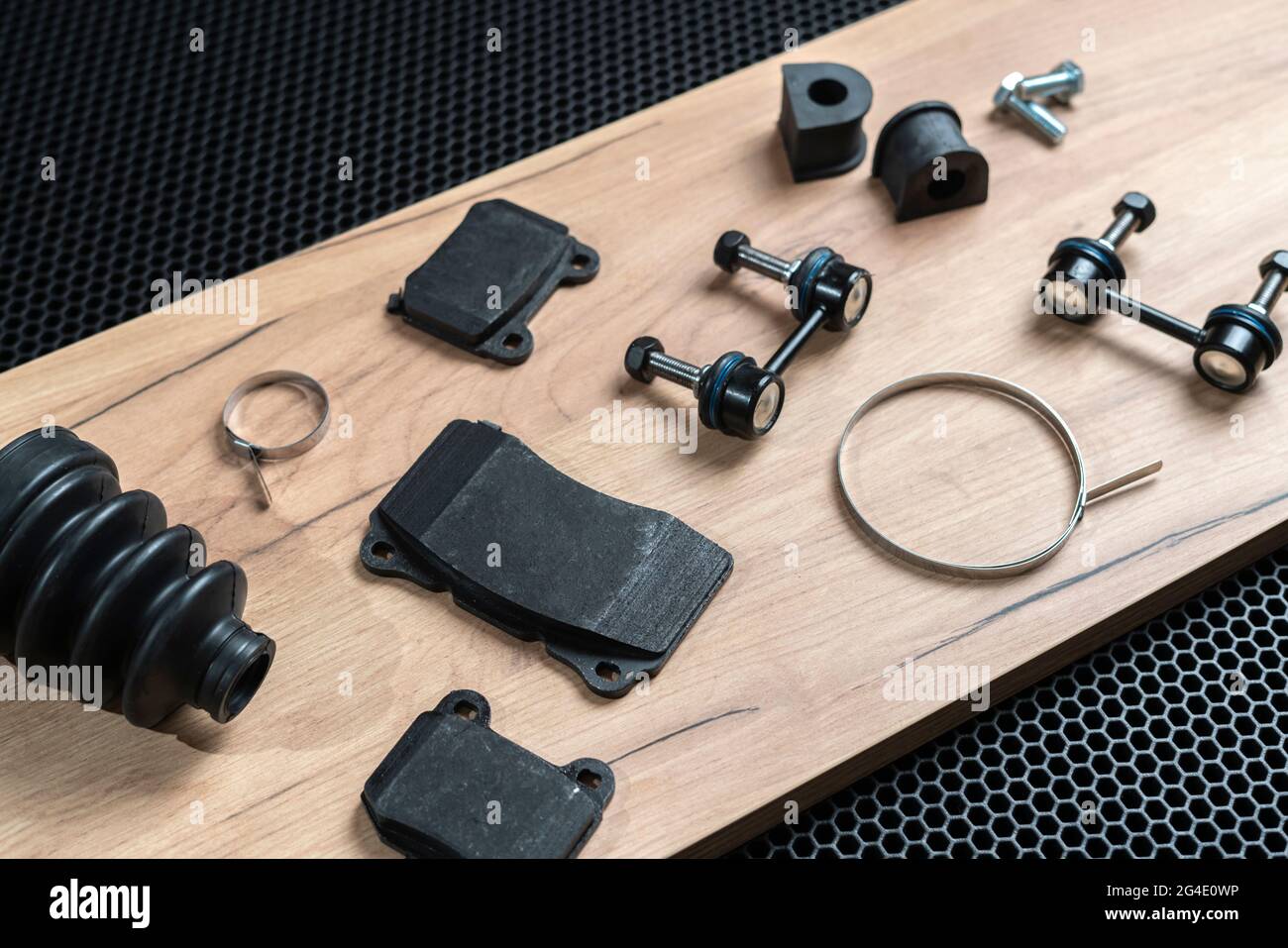 new car spare parts collection flat lay on dark background, change ...