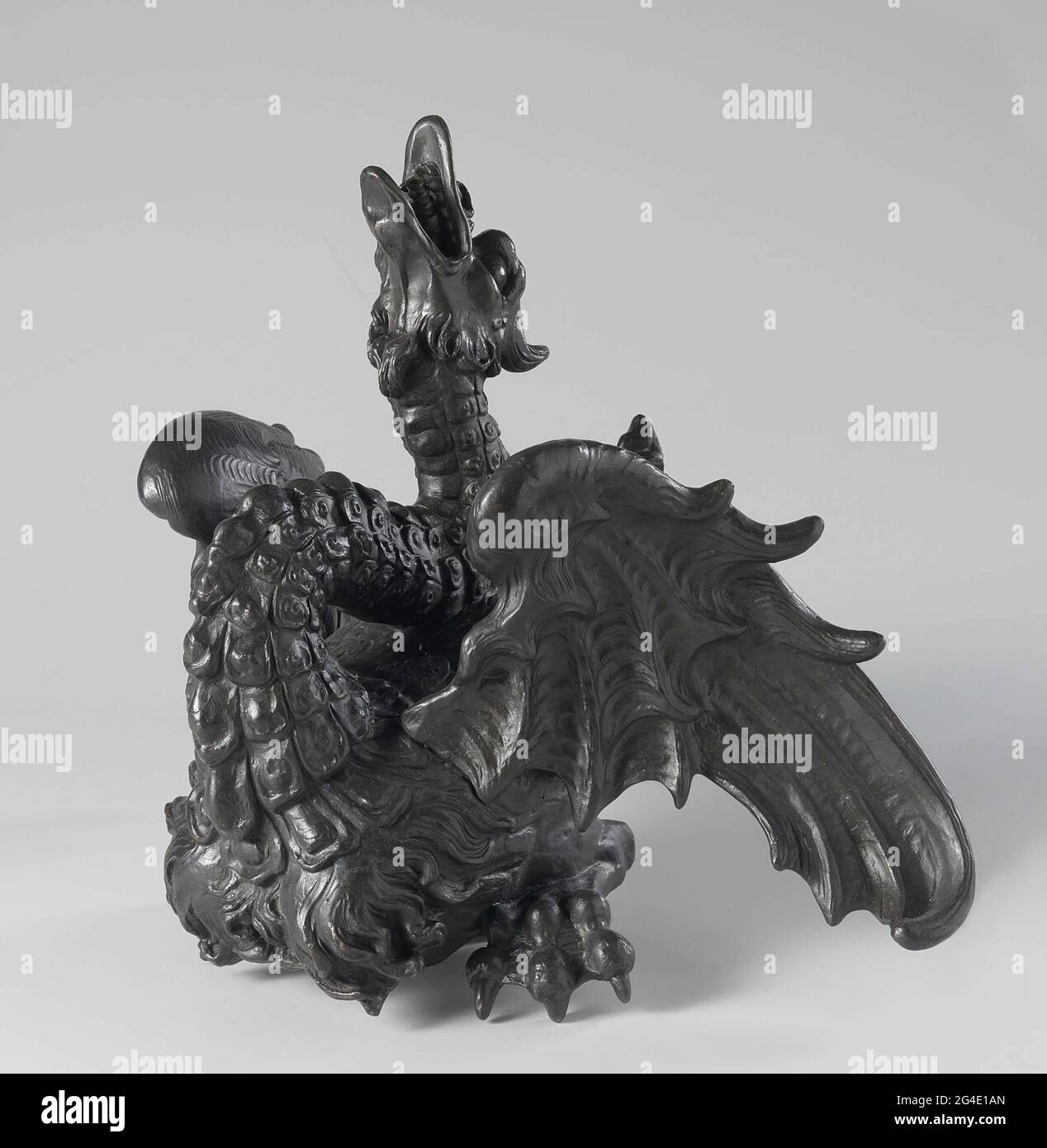 . Dragon, which simplified with a thrown head and scalyed neck rests on ...