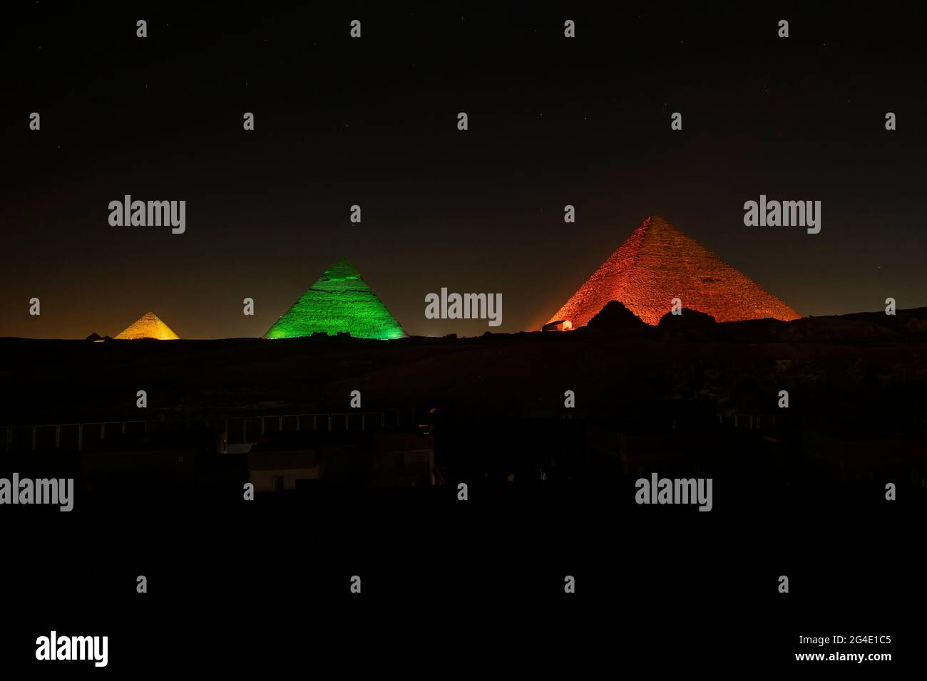 The Great Pyramids of Giza in the night laser light during the evening ...