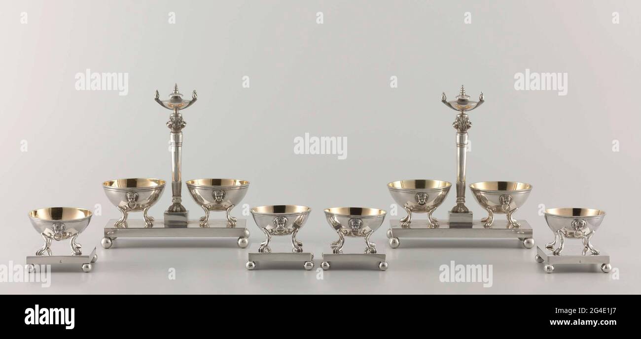 . Half-spherical container on four claws, standing on a square plate ...