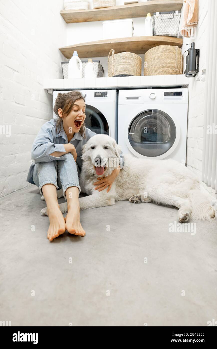 Woman washing her dog hi-res stock photography and images - Alamy