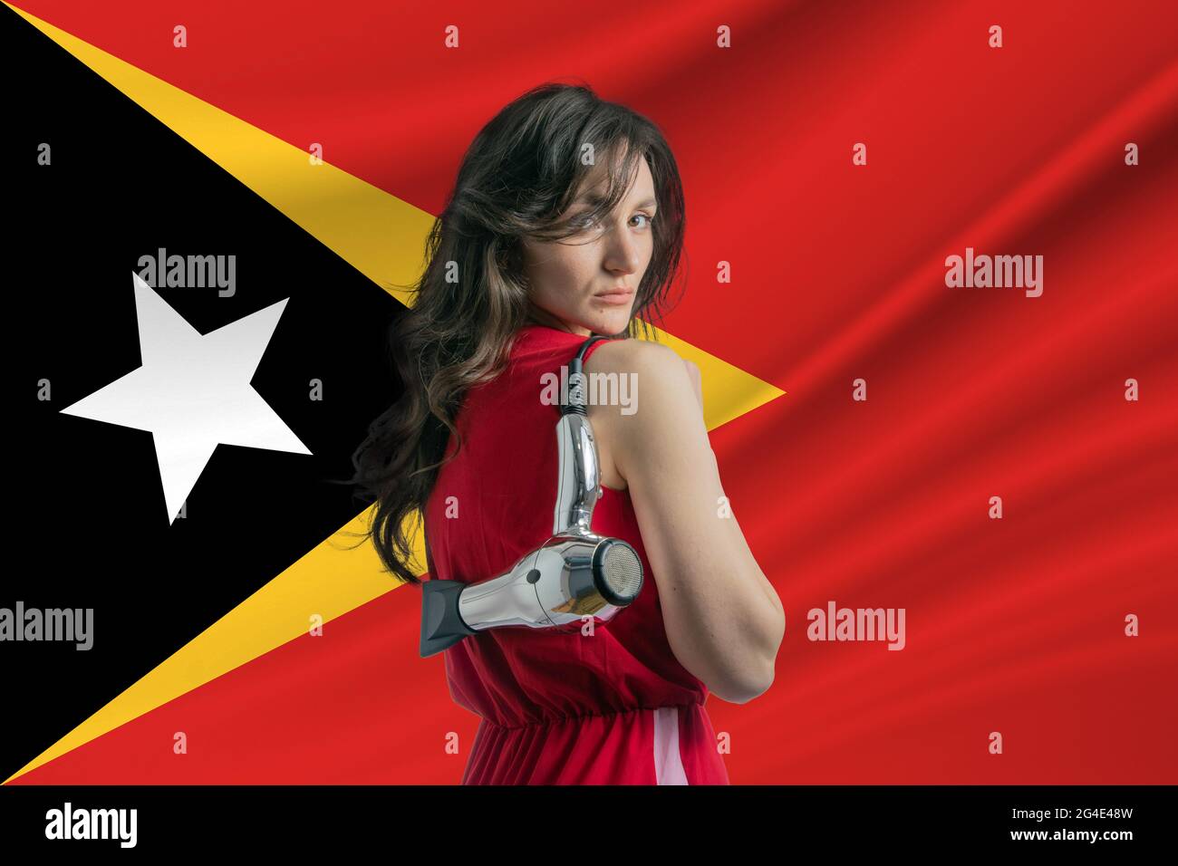 Beauty industry in East Timor. Happy female hairdresser holding ...