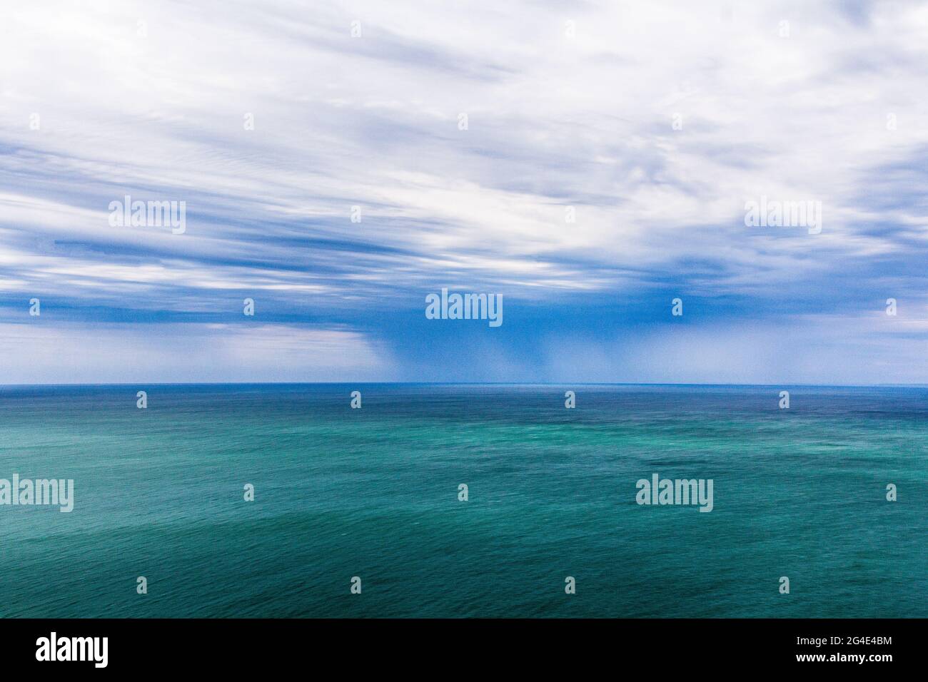 Rain in the sea. The water cycle. Sea and rain Stock Photo - Alamy