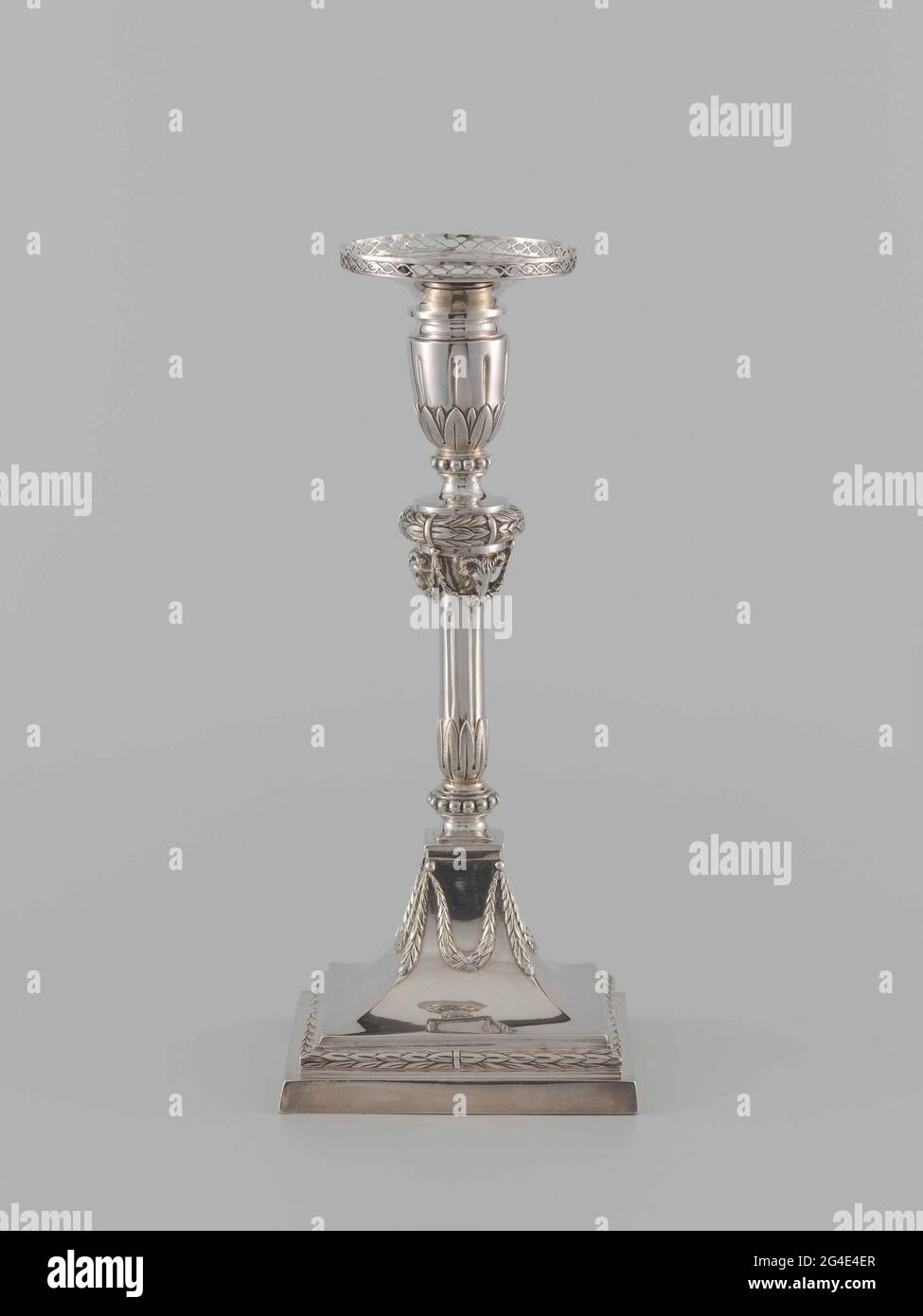 . Candlestick consisting of a square foot and a round trunk, candle ...