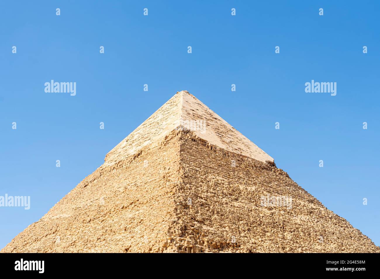 The high pyramid of Chephren on the background of a blue sky with ...