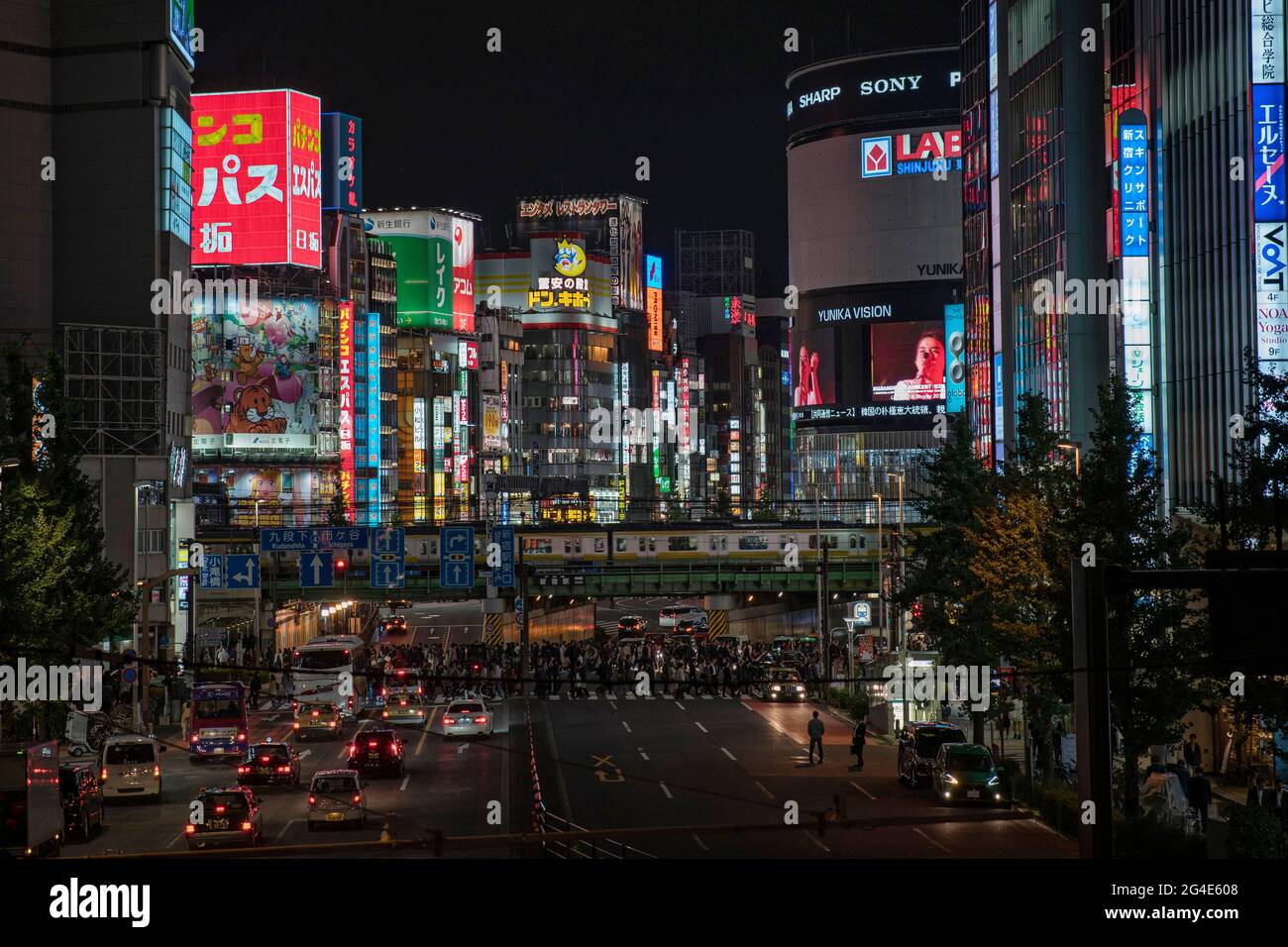 Tall buildings and neon lights in Shinjuku, Tokyo, Japan Stock Photo ...