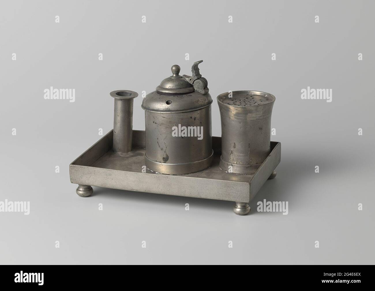 Sand spreader from a tin ink set. Sand spreader of tin with cylindrical ...