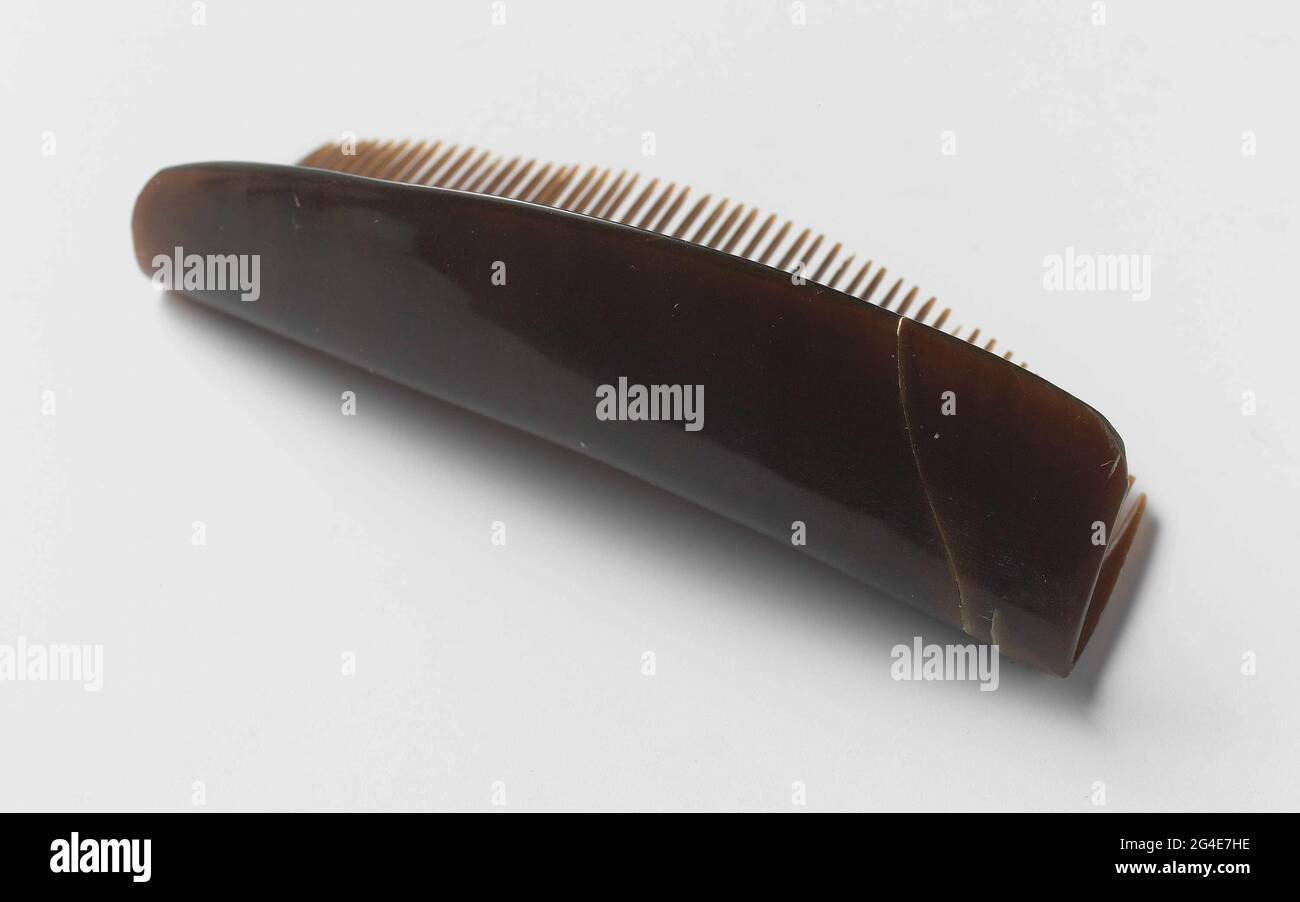 . Hair comb of turtle and horn with an unmedged tapered back that is ...
