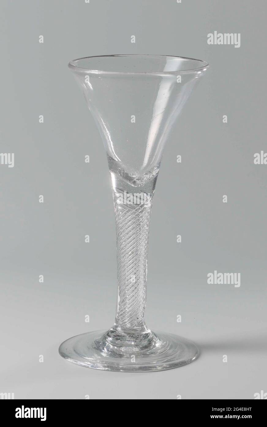 . Slinger glass with conical foot and lightly flared tribe. In the ...