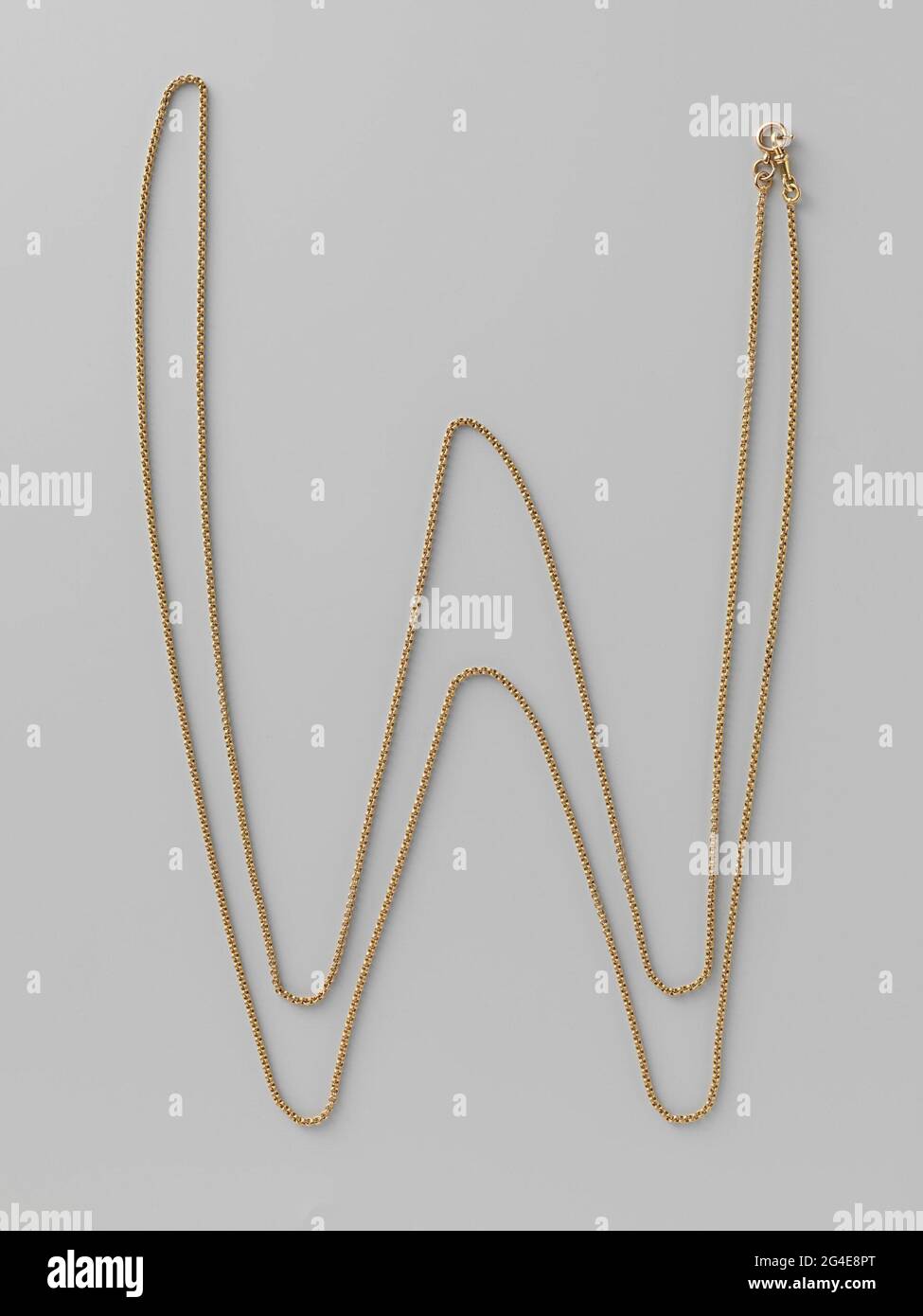 Ladies watch neck chain. Golden chain from a ladies watch Stock Photo ...