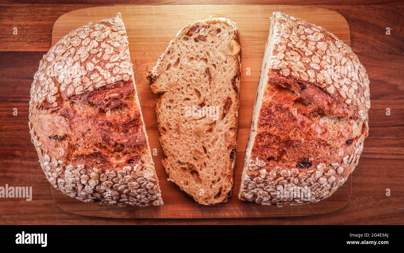 Horizontal top view background of two ends of bread with a thin slice ...