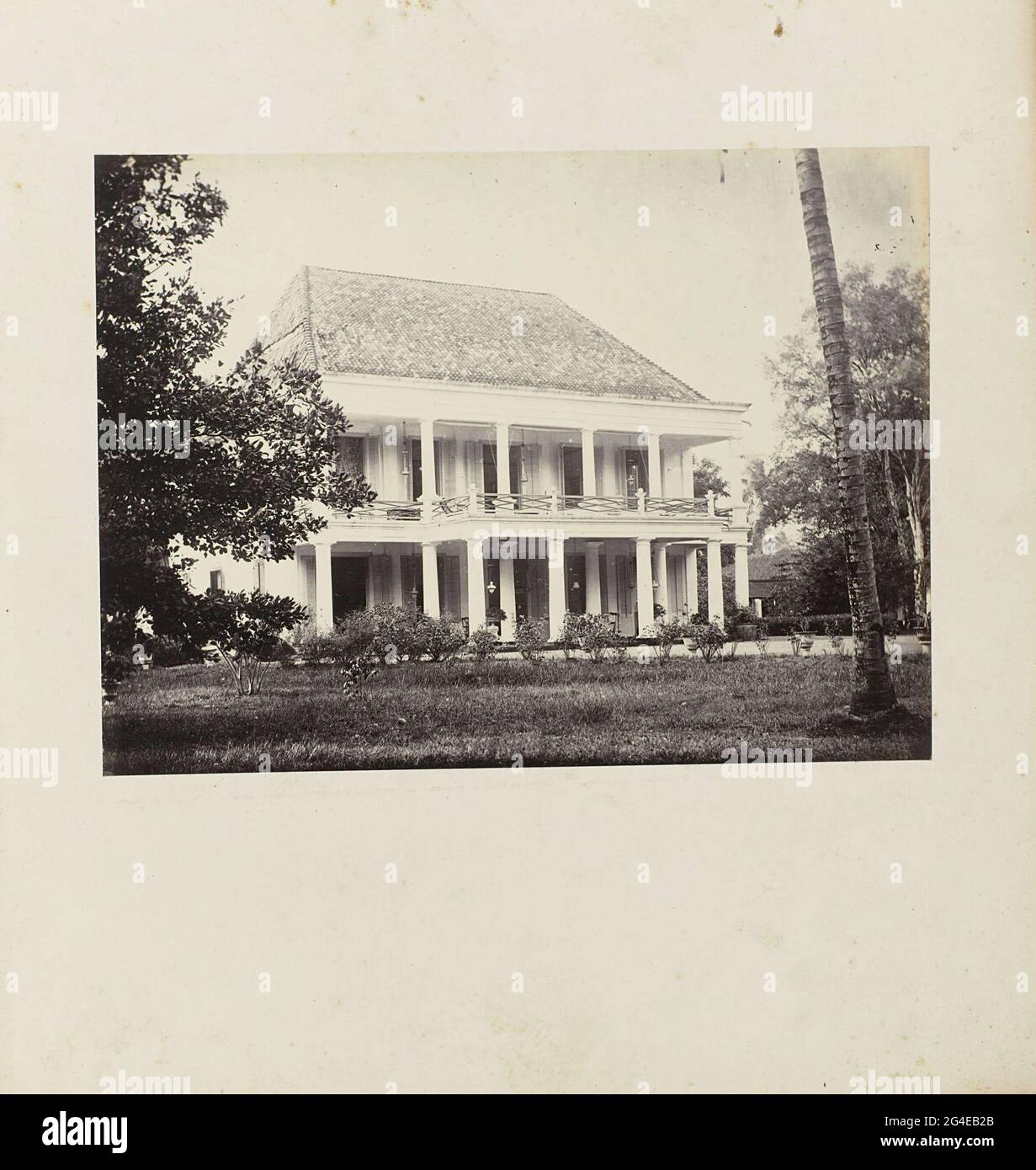 . A house with two floors with columns, too Batavia, possibly to ...