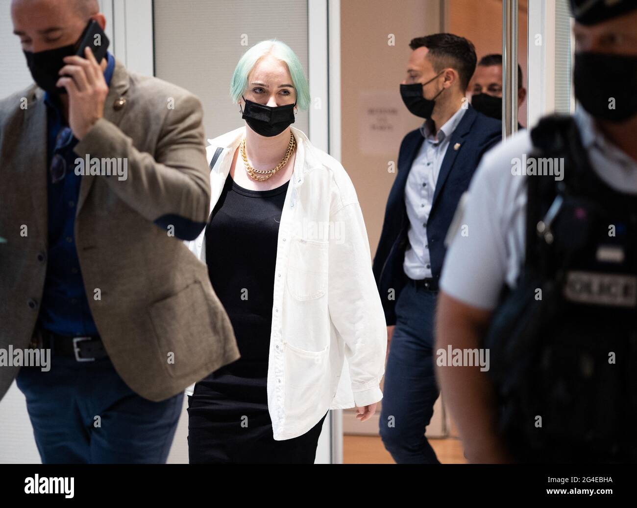 The teenager identifying herself online as Mila leaves the courtroom on ...