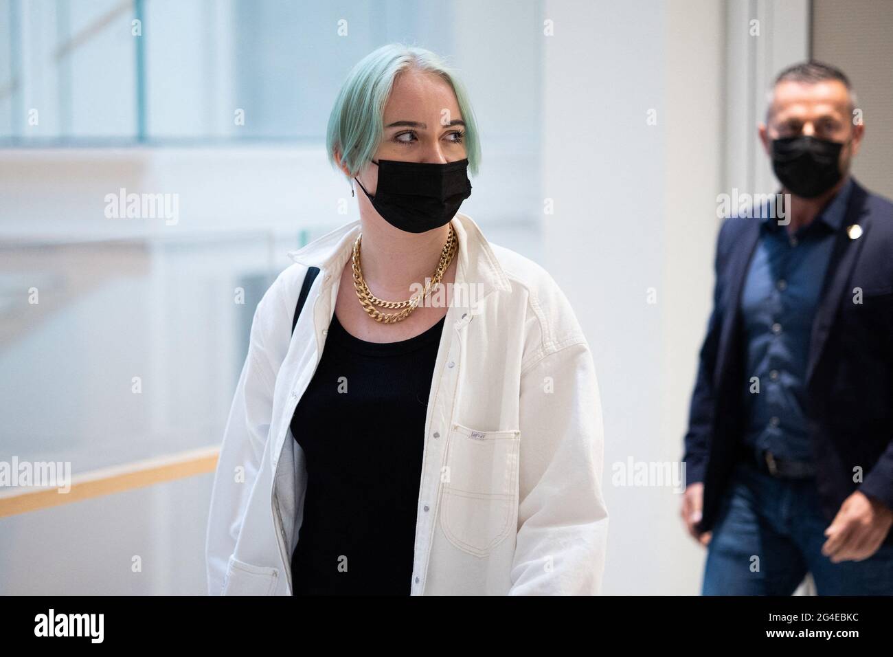 The teenager identifying herself online as Mila leaves the courtroom on ...