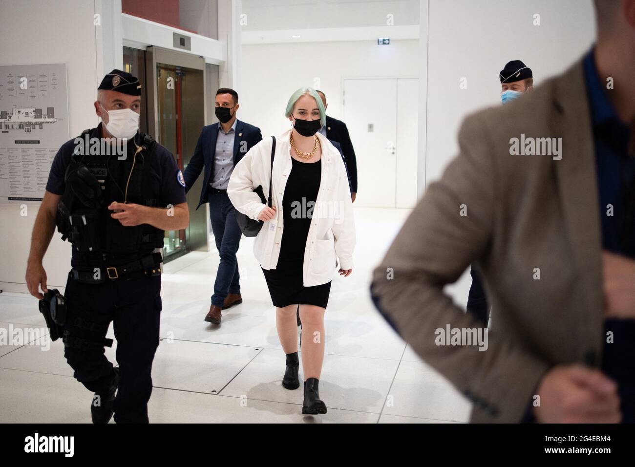 The teenager identifying herself online as Mila leaves the courtroom on ...