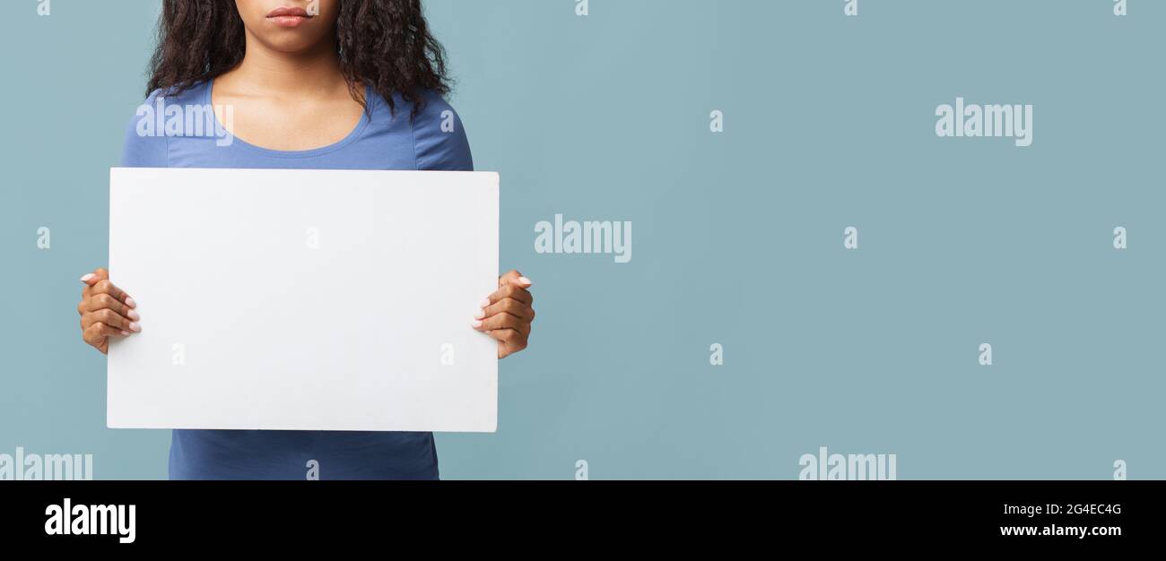 Place for your ad. Unrecognizable african american woman holding blank ... Place for your ad. Unrecognizable african american woman holding blank ...