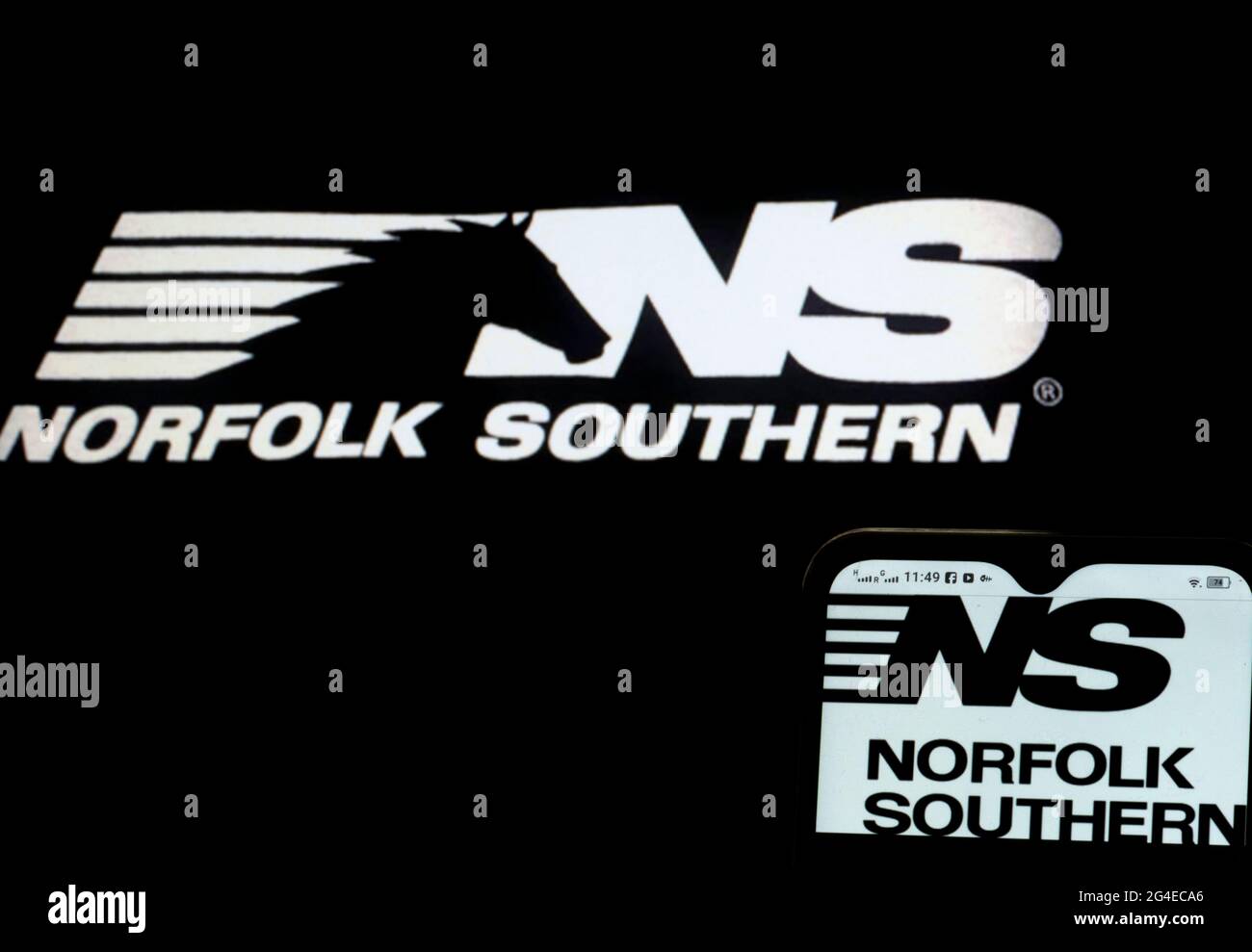 In this photo illustration, a Norfolk Southern Corporation logo seen ...